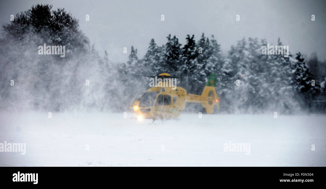 Rescue helicopter in snow Stock Photo - Alamy