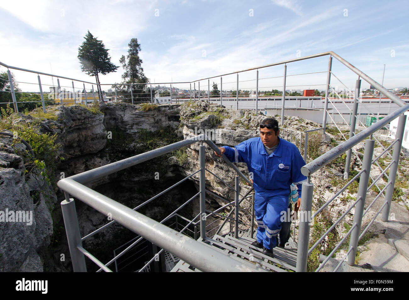 Puebla, Mexico. 18th Aug, 2015. A person comes out of the Cuexcomate ...