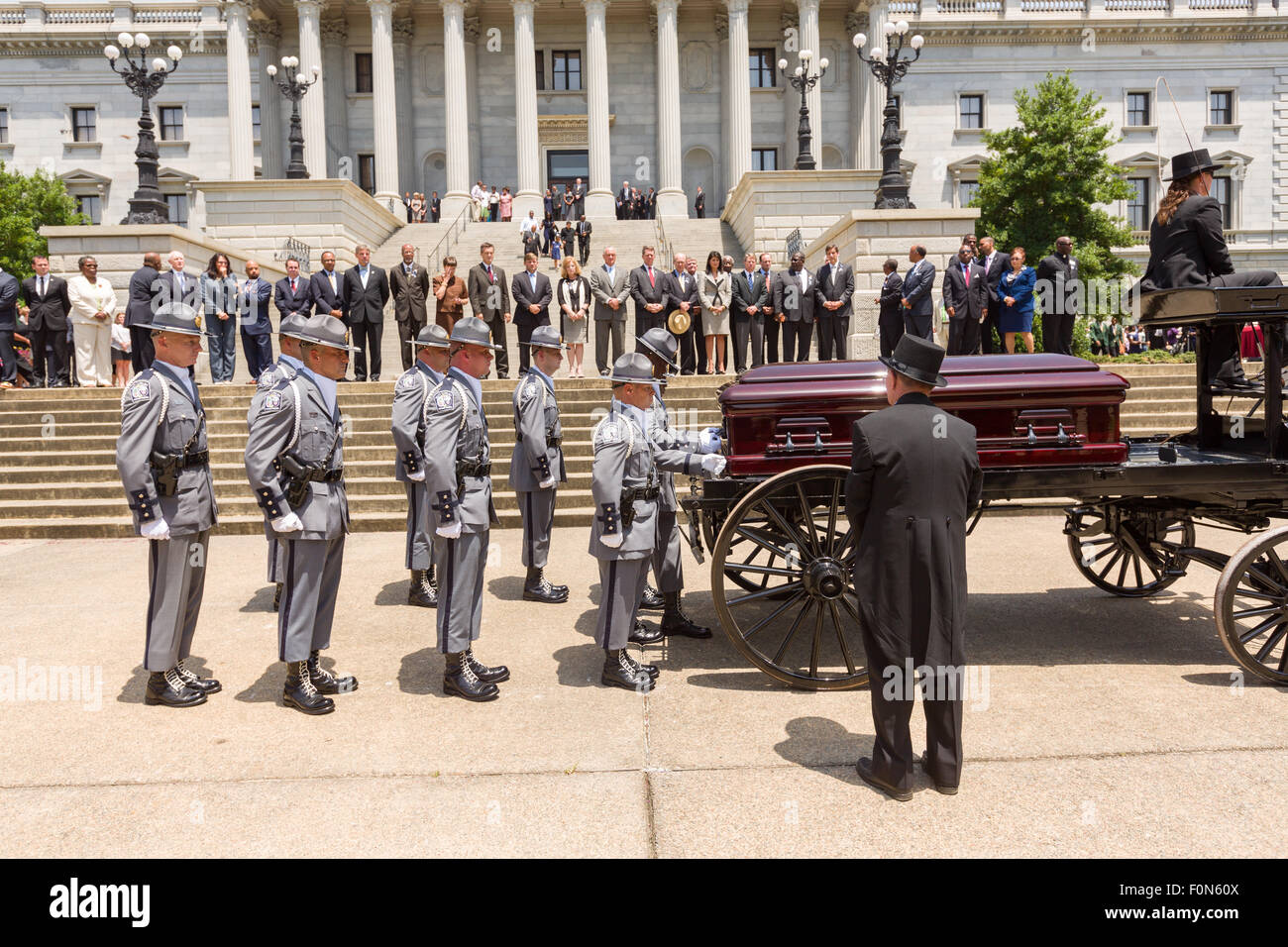 Police honor guard removes the casket of slain State Senator Clementa ...
