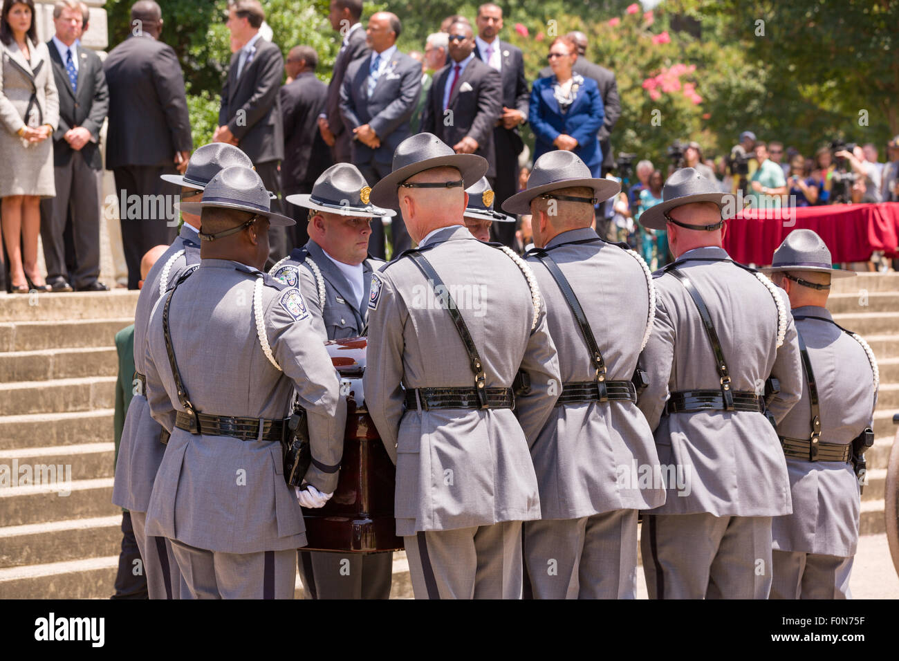 Police honor guard removes the casket of slain State Senator Clementa ...