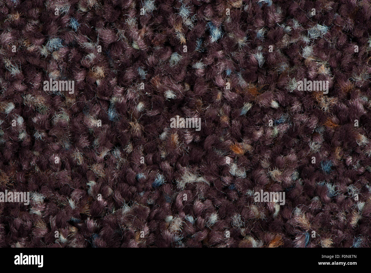 Closeup detail of purple carpet texture background Stock Photo - Alamy