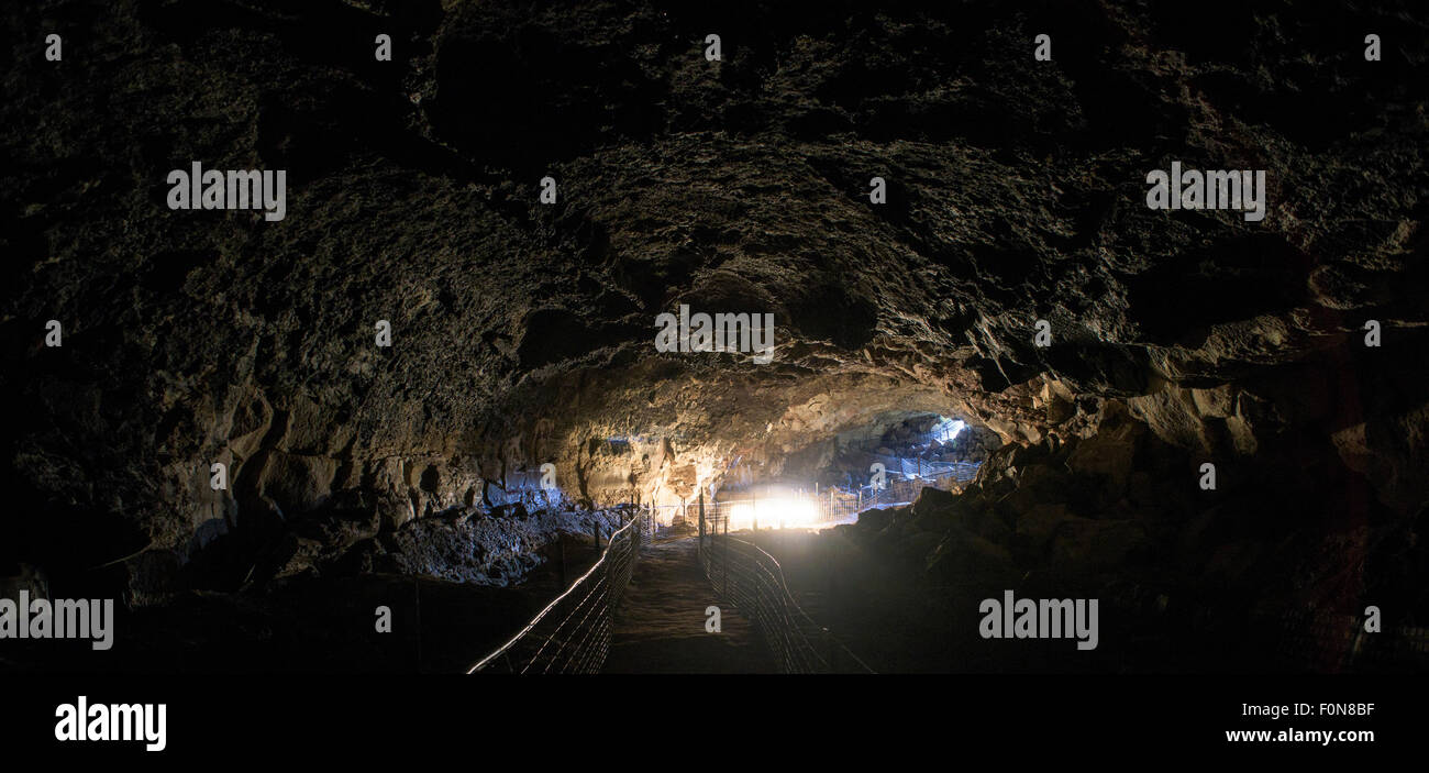 Wide shot of underground cave with designated walking paths Stock Photo ...