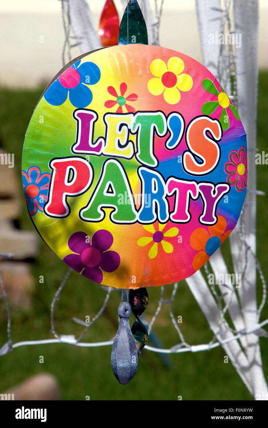 Vintage lets party sign hanging with green hi-res stock photography and ...