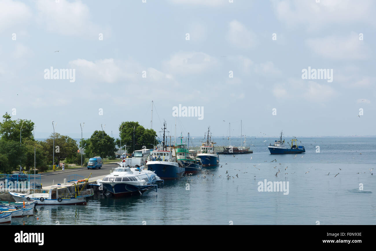 sea harbor with the moored ships and boats Stock Photo - Alamy