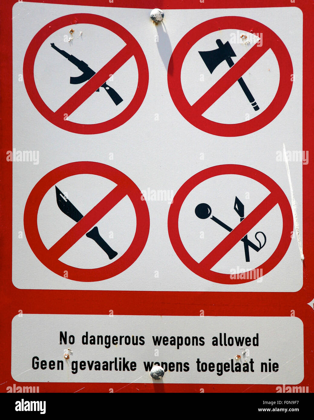 Signboard at the entrance of Cape Town local train station saying that ...