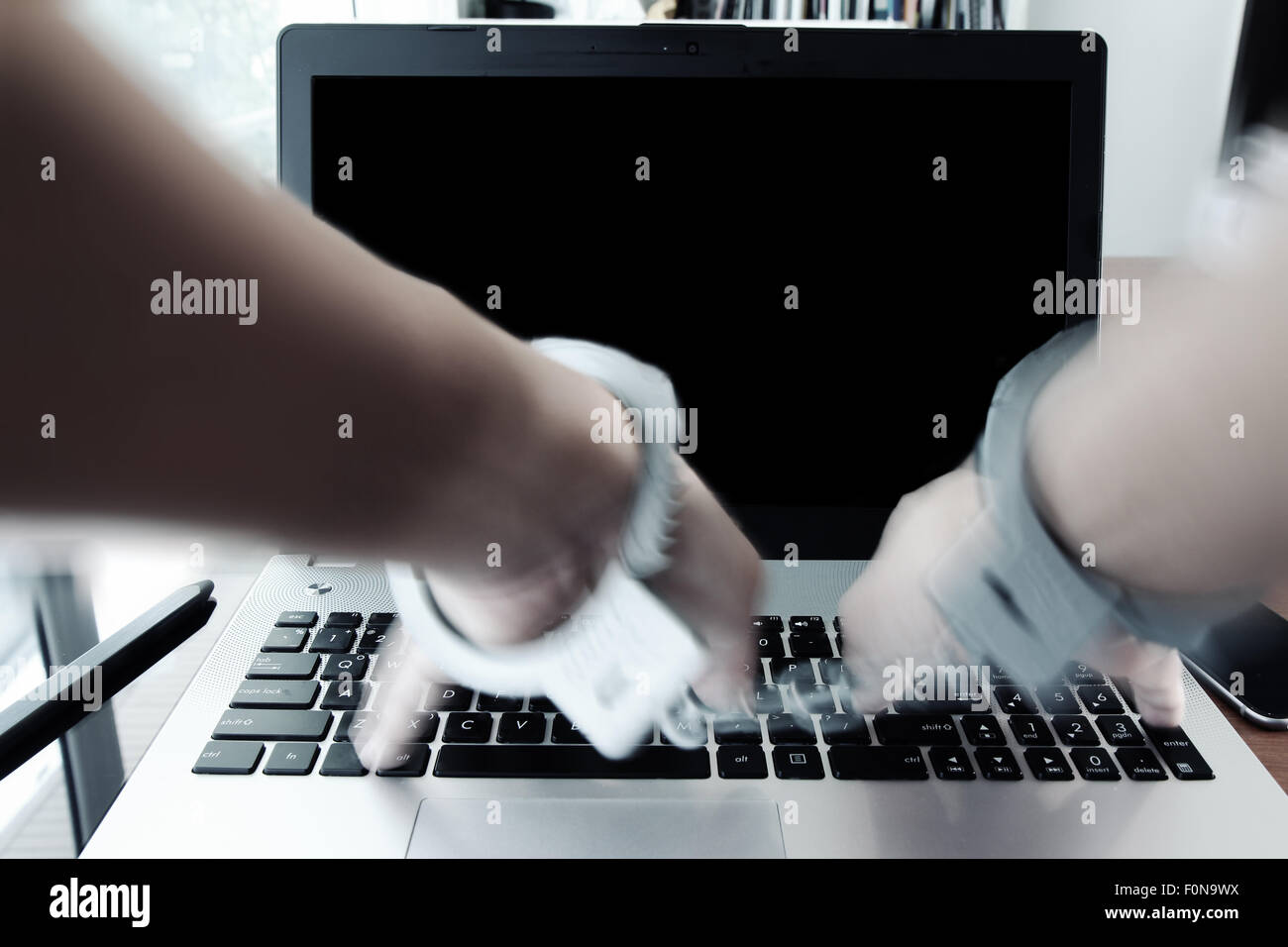 Hand cuffs and keyboard hi-res stock photography and images - Alamy