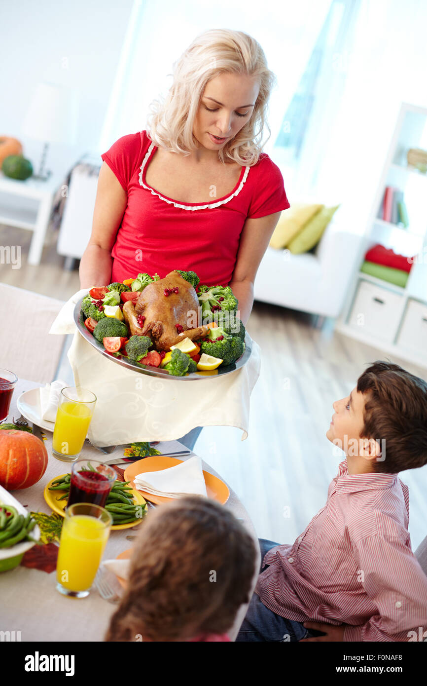 Woman serving Thanksgiving poultry Stock Photo - Alamy