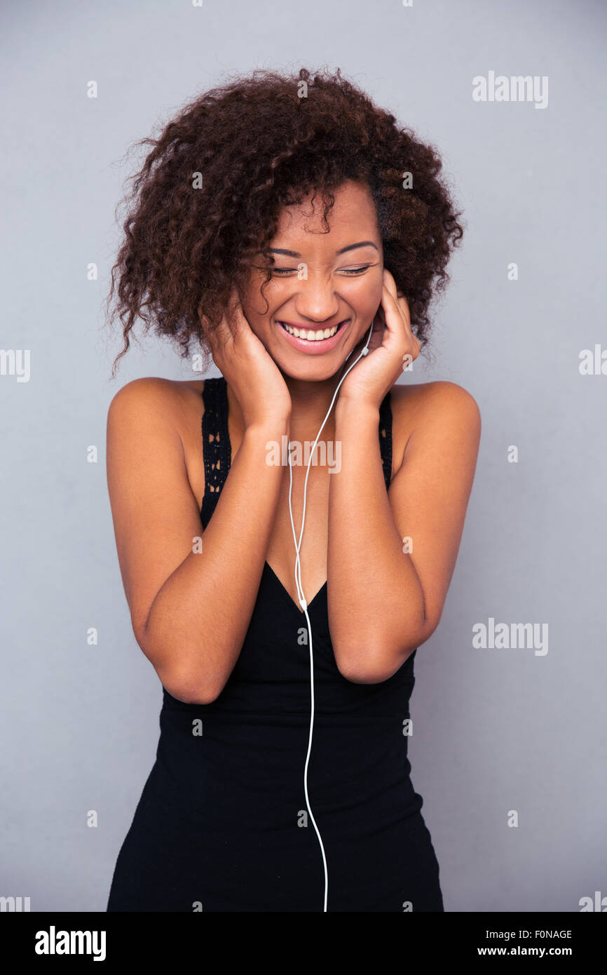 Female afro american with headphones hi-res stock photography and ...