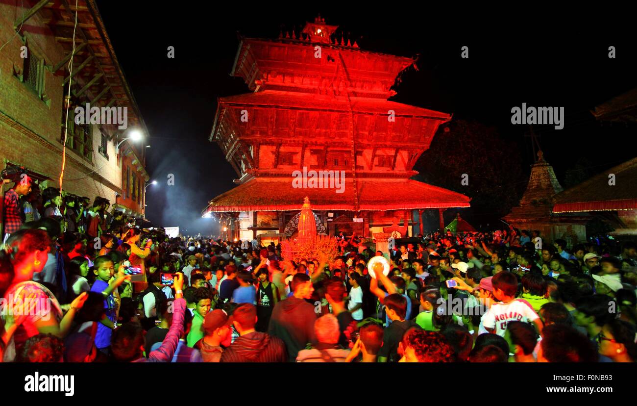 Kathmandu, Nepal. 18th Aug, 2015. Devotees gather at the Bagh Bhairav ...