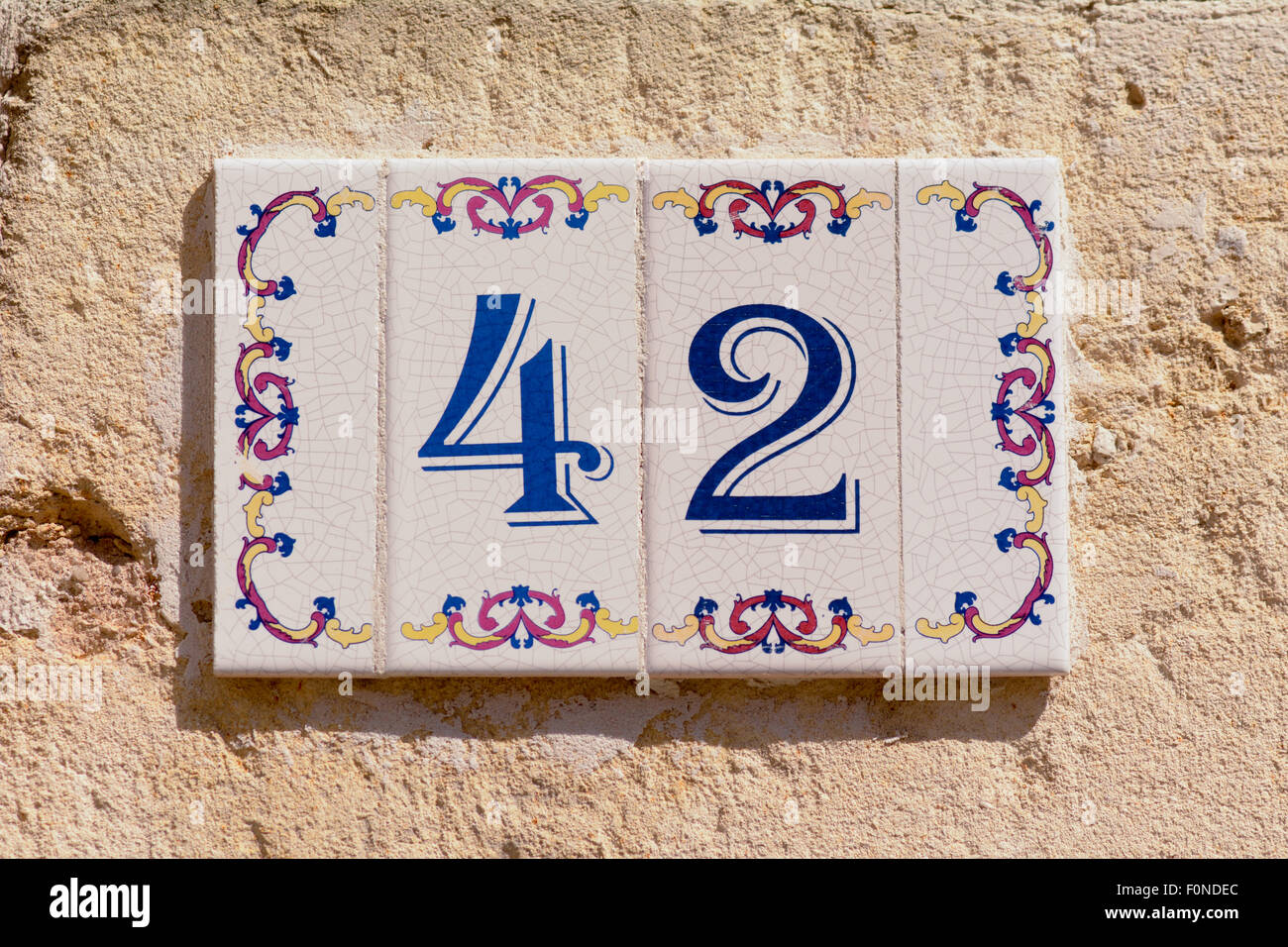 Tiles for house number 42 on wall of house in French village Stock ...