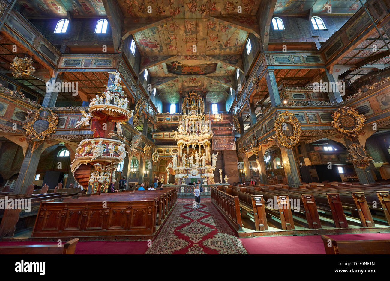 Interior shot of magnificently decorated wooden Protestant Church of ...