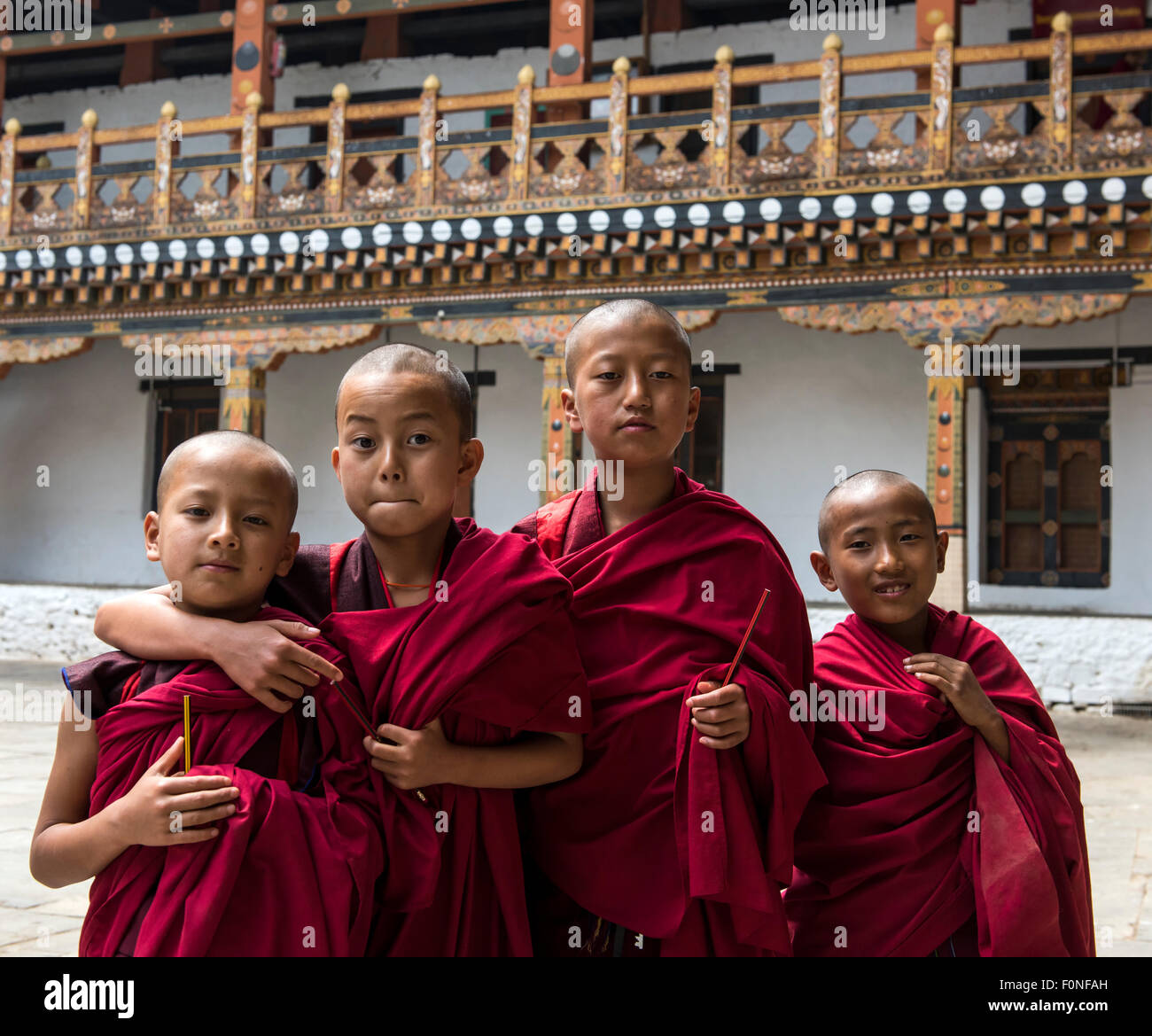 Young monks by temple hi-res stock photography and images - Alamy