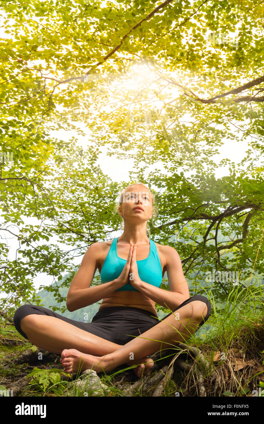 Woman relaxing in beautiful nature Stock Photo - Alamy
