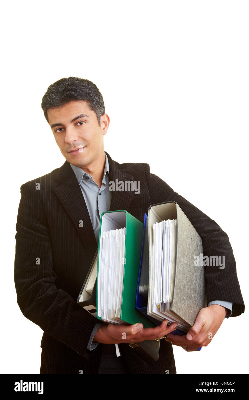 Businessman carrying many files Stock Photo - Alamy
