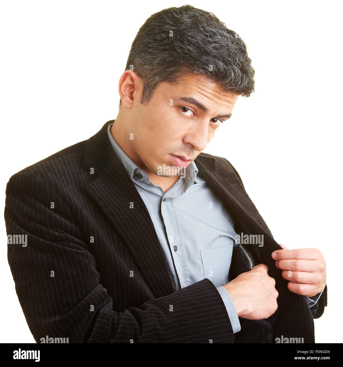 Businessman reaching for his wallet in his coat pocket Stock Photo - Alamy