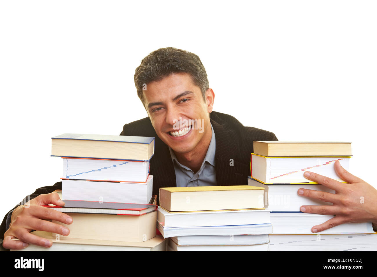 Happy businessman with many books Stock Photo - Alamy