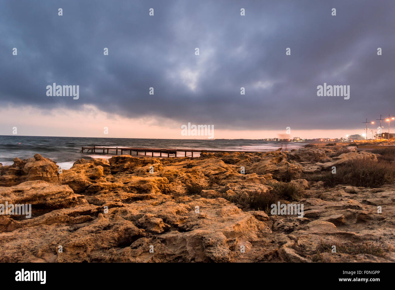 radiant sea beach sunset Stock Photo - Alamy