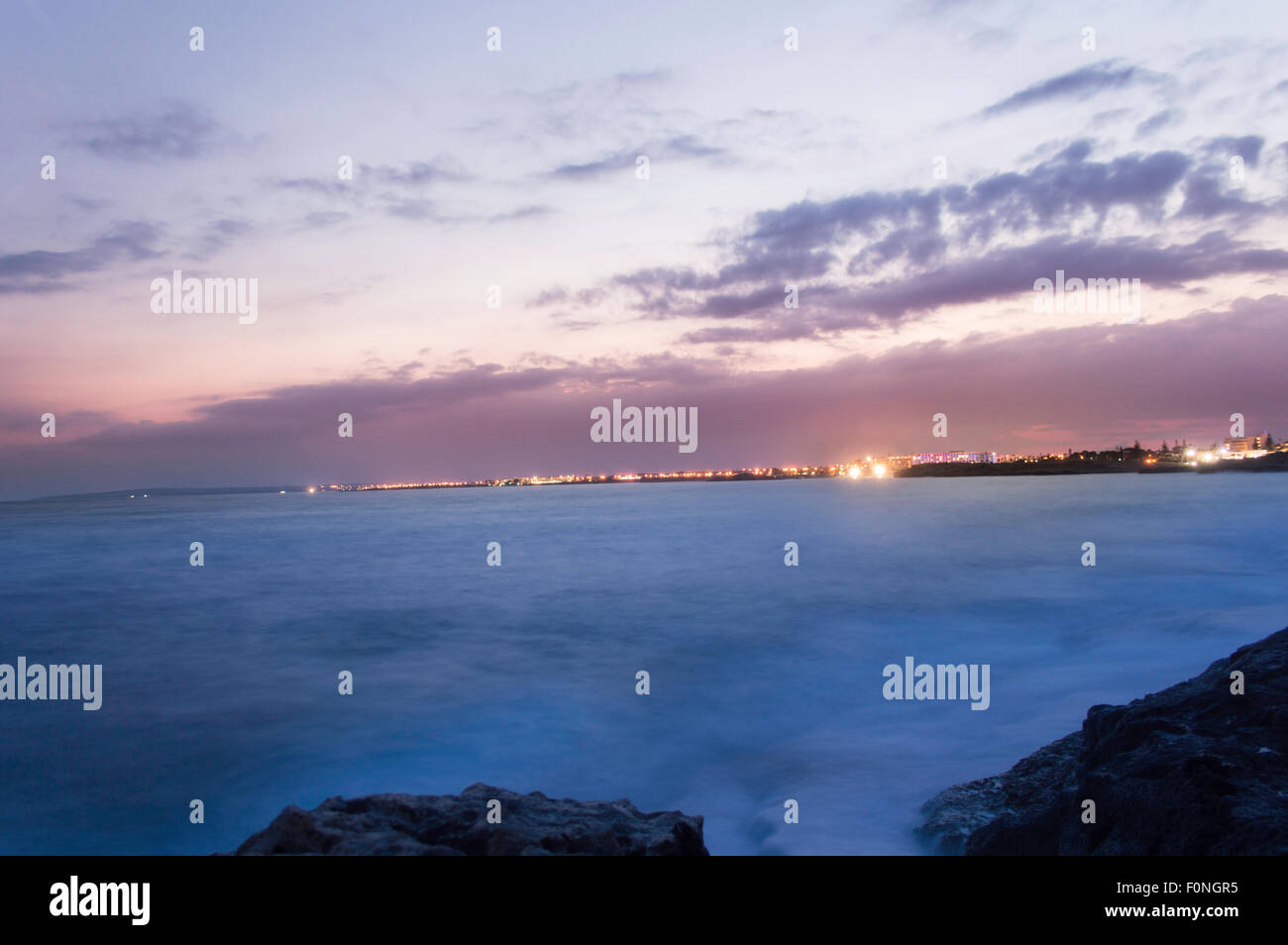 radiant sea beach sunset Stock Photo - Alamy