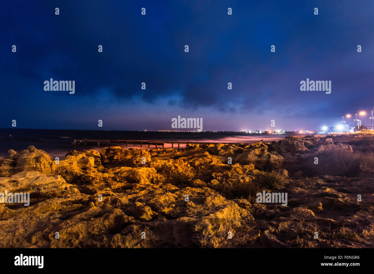 radiant sea beach sunset Stock Photo - Alamy