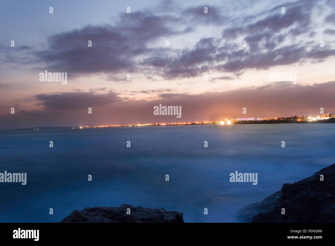 radiant sea beach sunset Stock Photo - Alamy