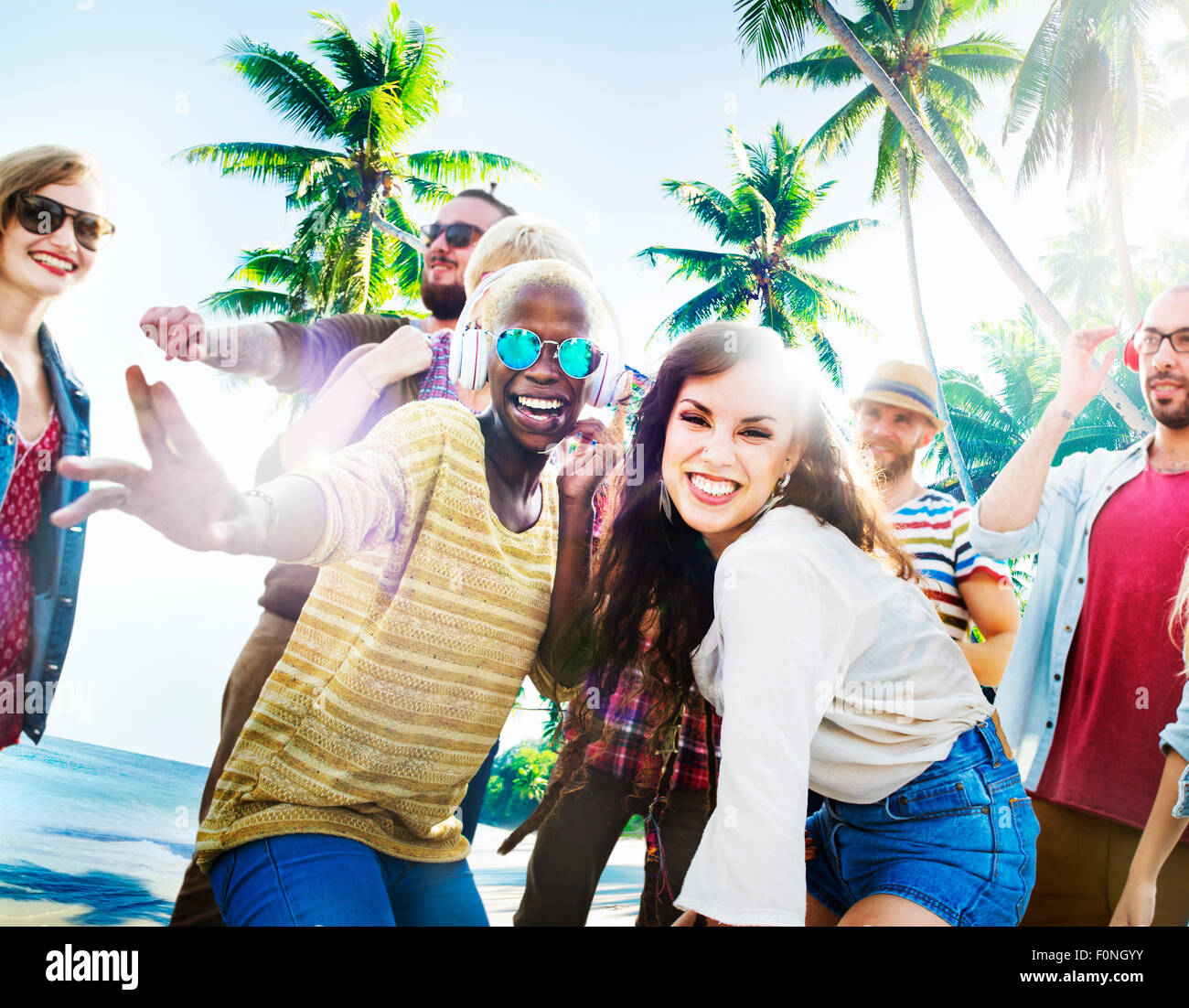 Friends Summer Beach Party Dancing Concept Stock Photo - Alamy