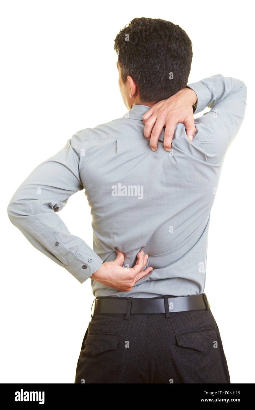 Man standing with pain in his back Stock Photo - Alamy