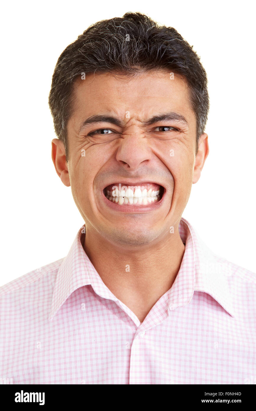 Man baring his teeth to the camera Stock Photo - Alamy