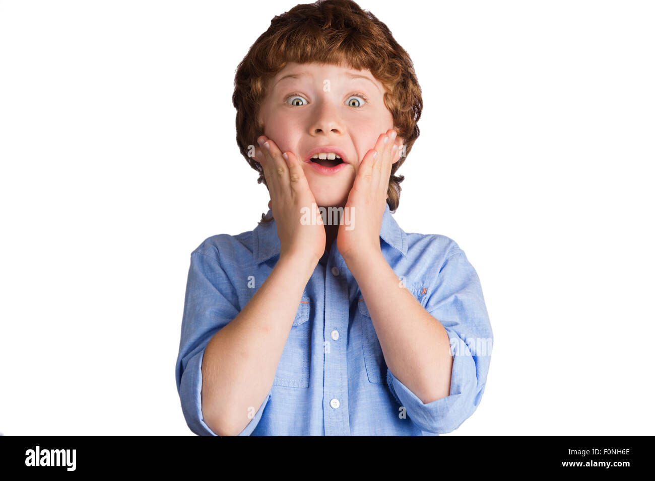 Handsome boy with surprised facial expression. Isolated on white ...