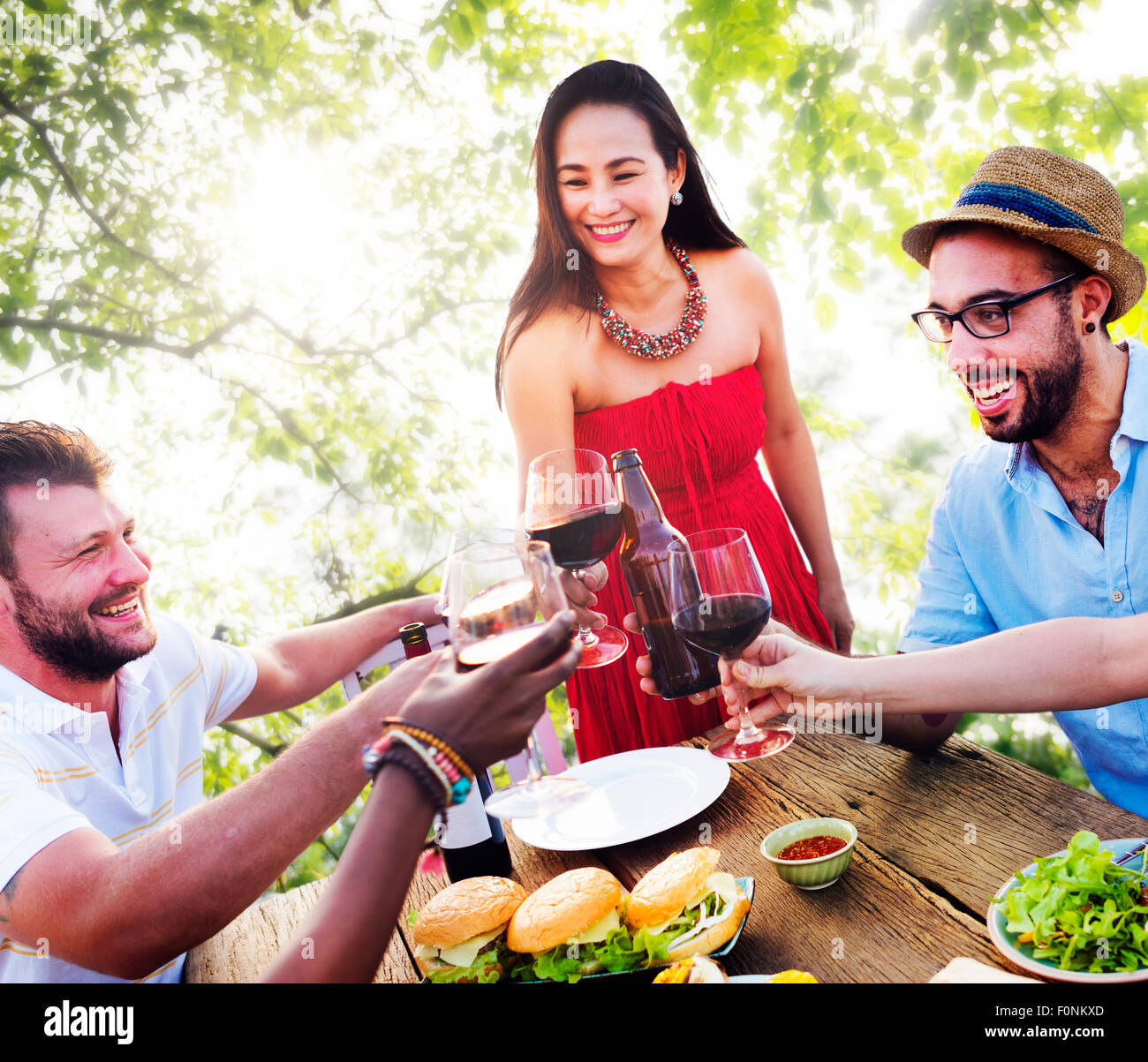 Friends Outdoors Vacation Dining Hanging out Concept Stock Photo - Alamy