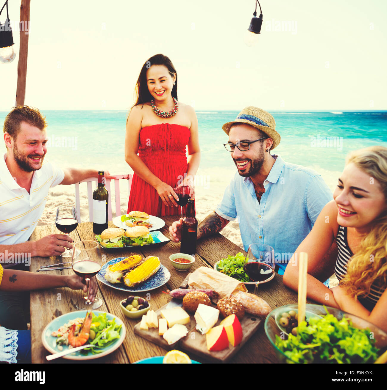 Friends Dining Summer Beach Party Cheerful Concept Stock Photo - Alamy