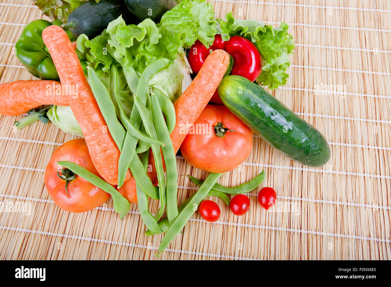 Fresh vegetables on wooden table Stock Photo - Alamy