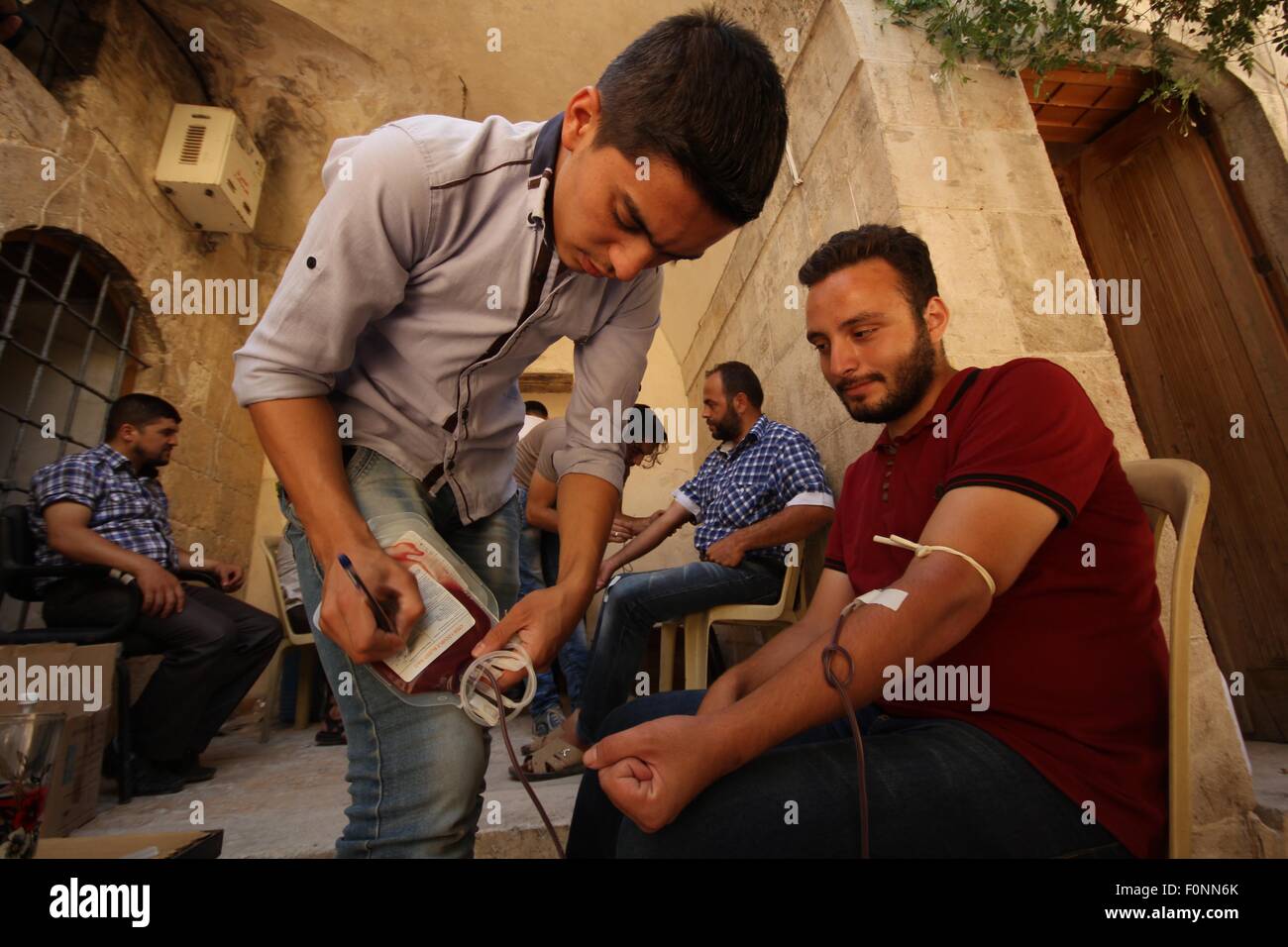 Aleppo, Aleppo, Syrian Arab Republic. 18th Aug, 2015. Syrians donate ...