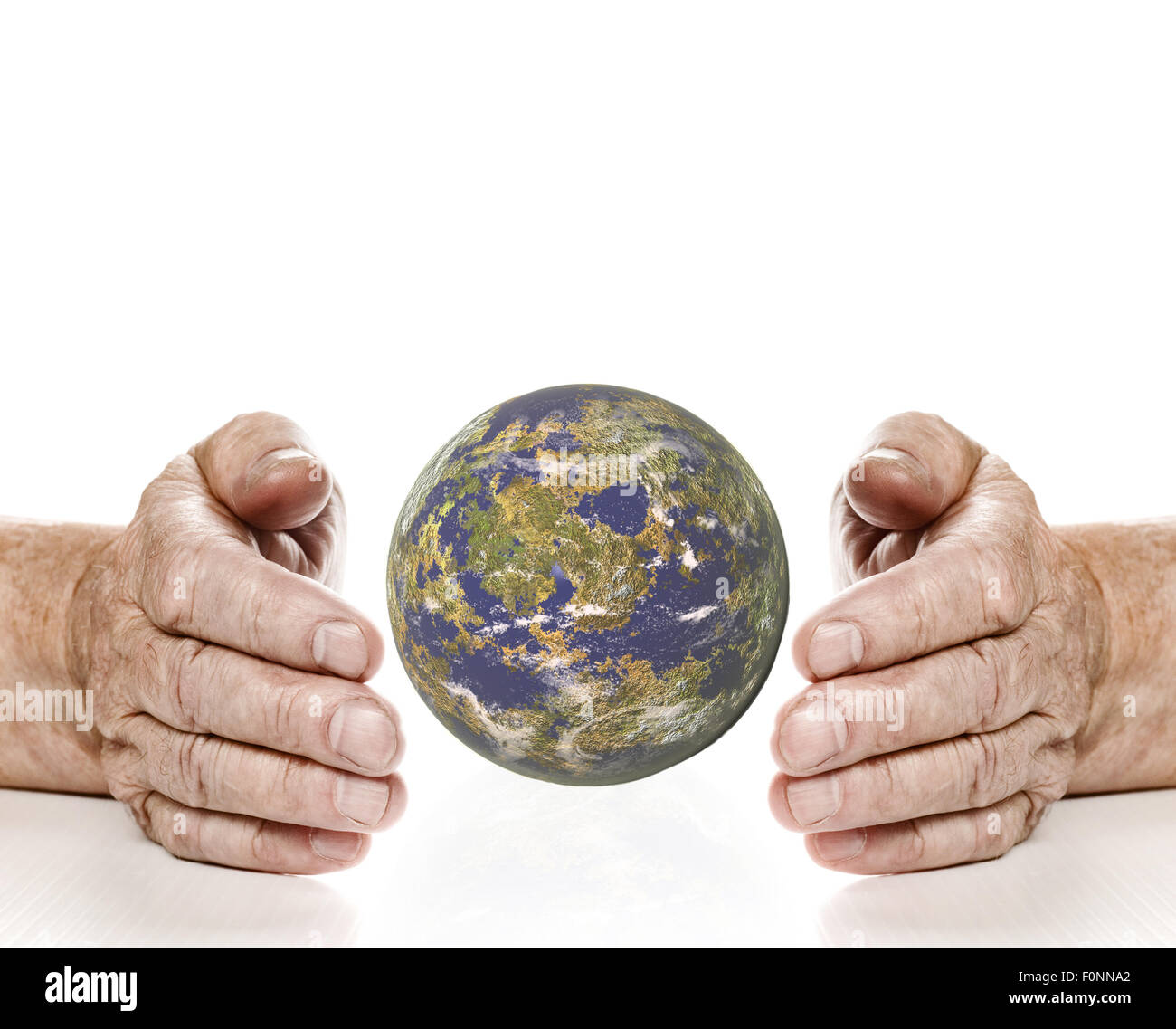 Old hands and planet between them. Isolated on white background Stock ...