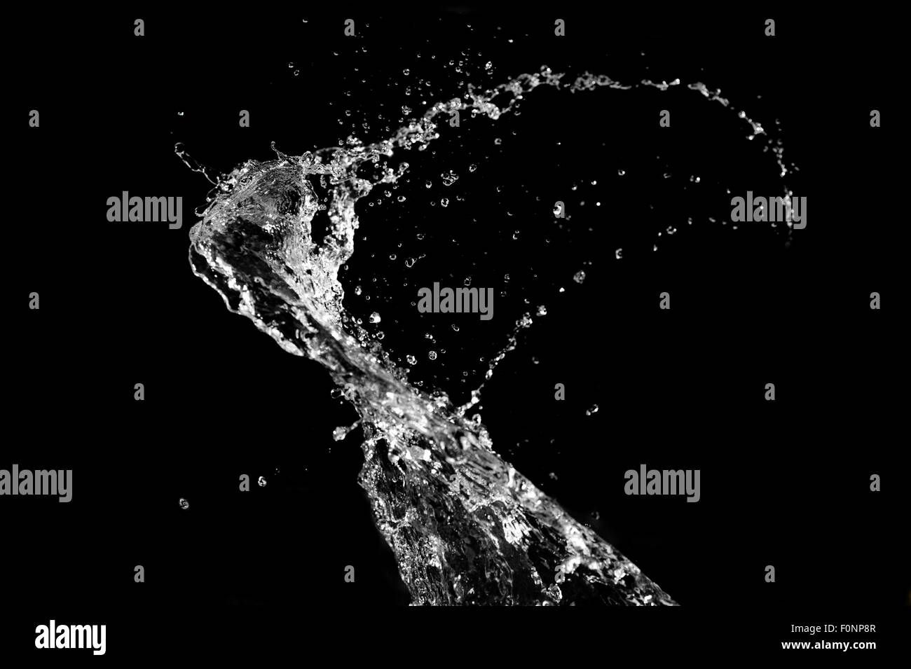 Stylish water splash. Isolated on black background Stock Photo - Alamy