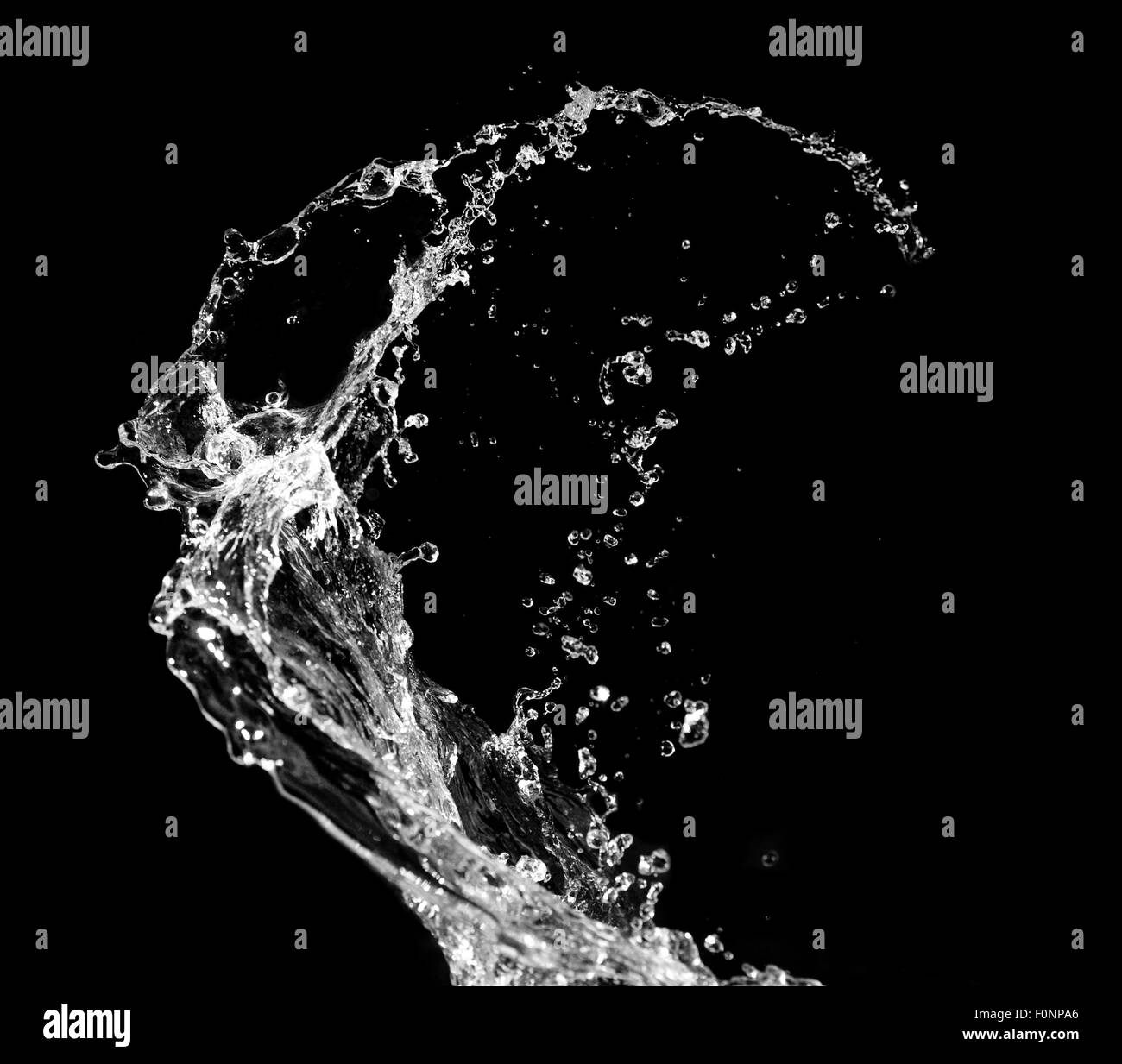 Stylish water splash. Isolated on black background Stock Photo - Alamy