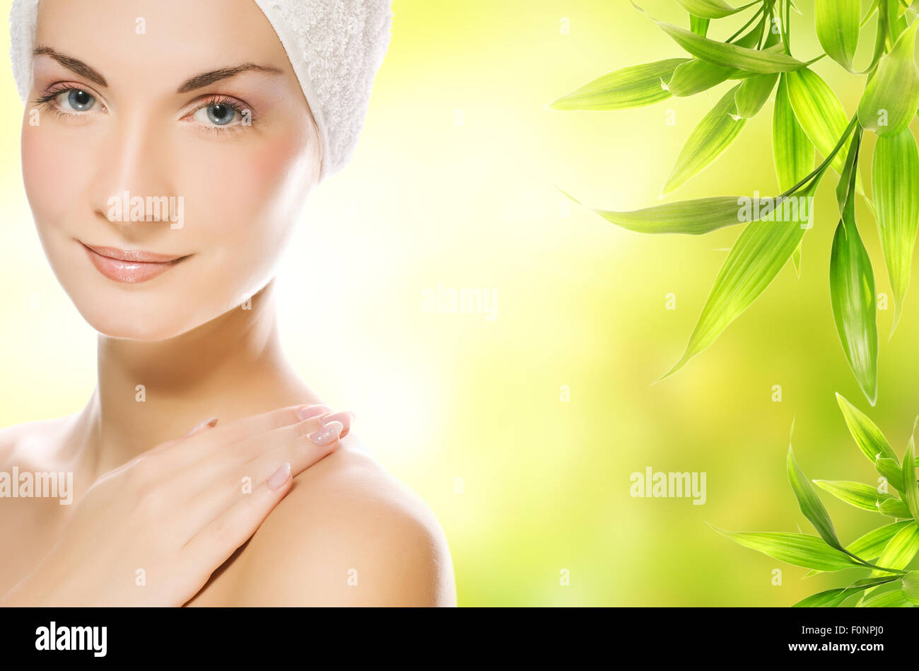 Beautiful young woman applying organic cosmetics to her skin Stock ...