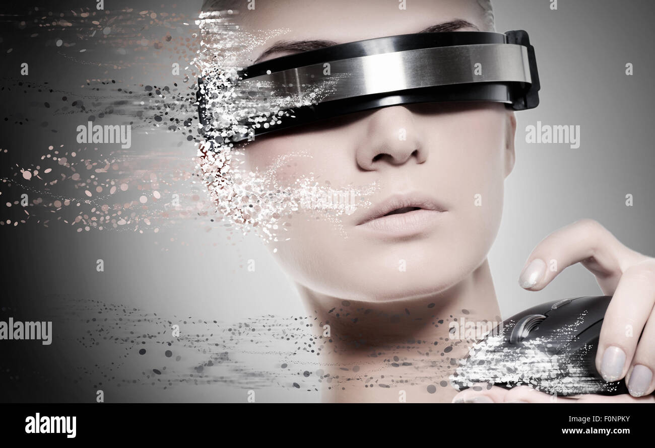 Beautiful female robot with computer mouse Stock Photo - Alamy