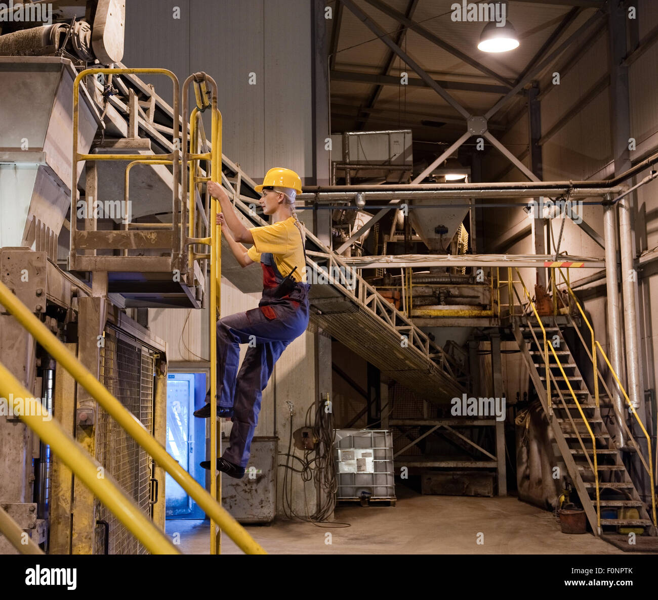 Female factory worker Stock Photo - Alamy