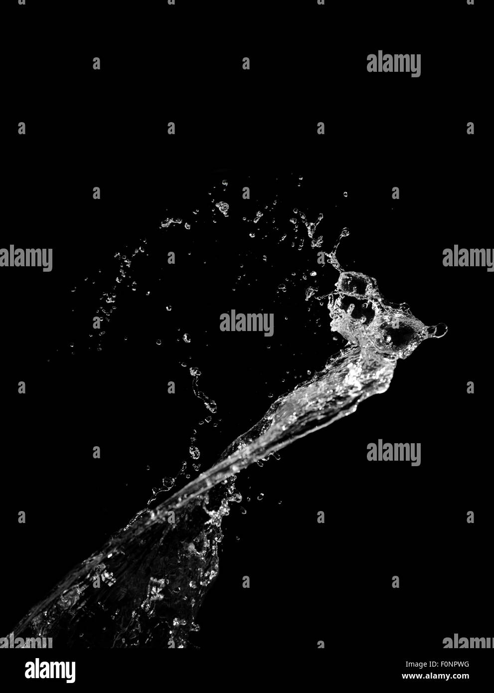 Water splash isolated on black background Stock Photo - Alamy