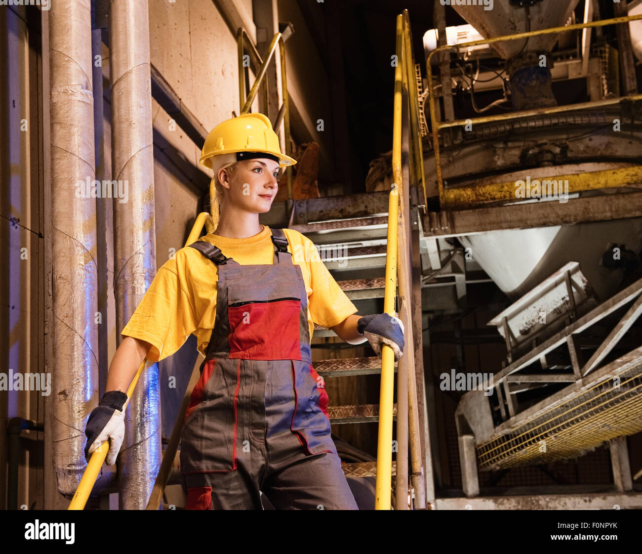 Factory female worker Stock Photo - Alamy