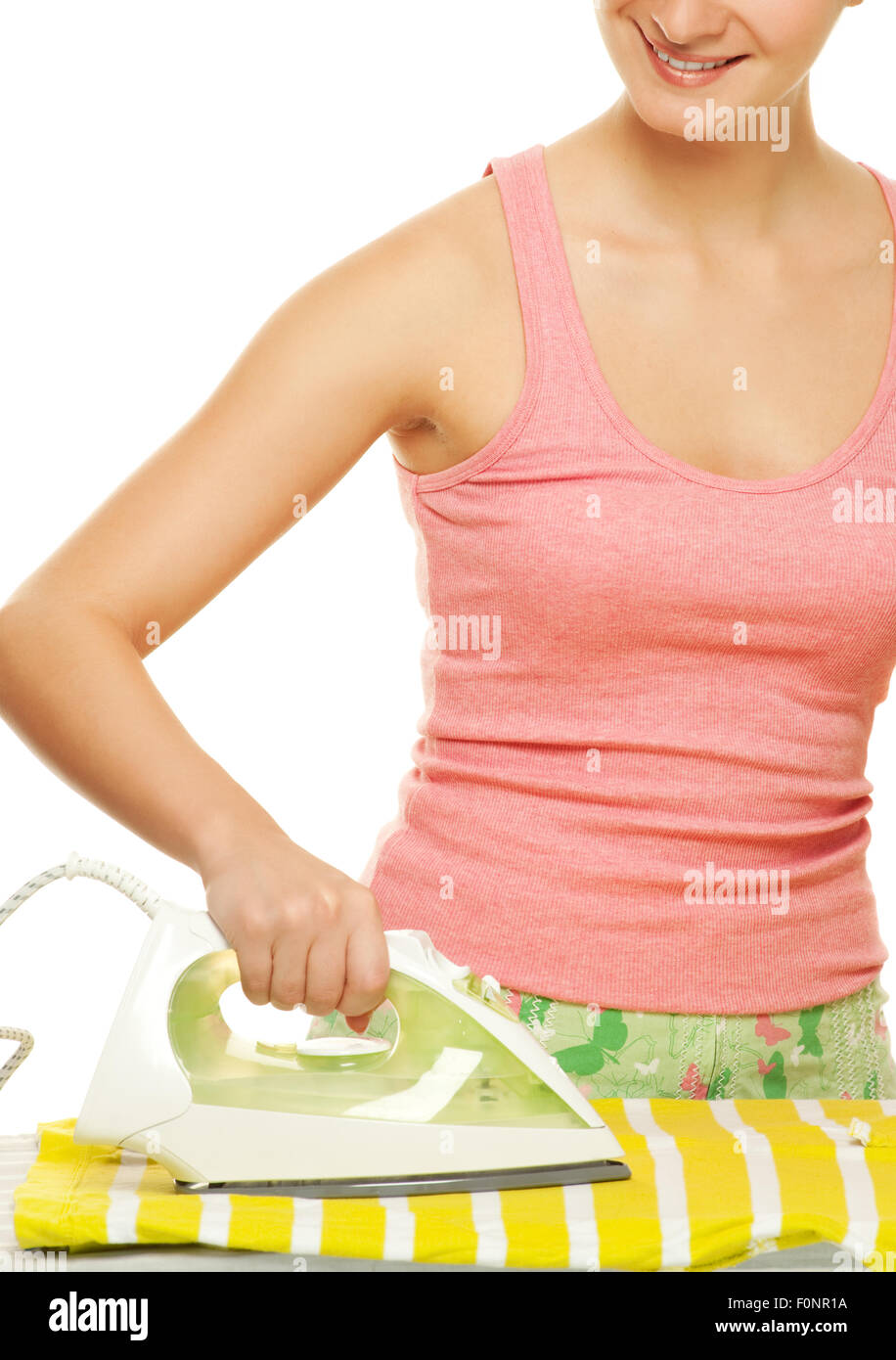 Beautiful woman ironing clothes. Isolated on white background Stock ...