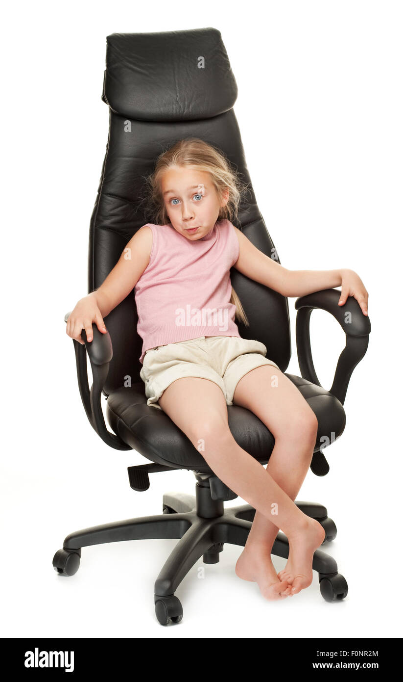 Young girl sitting on chair. Isolated on white background Stock Photo ...