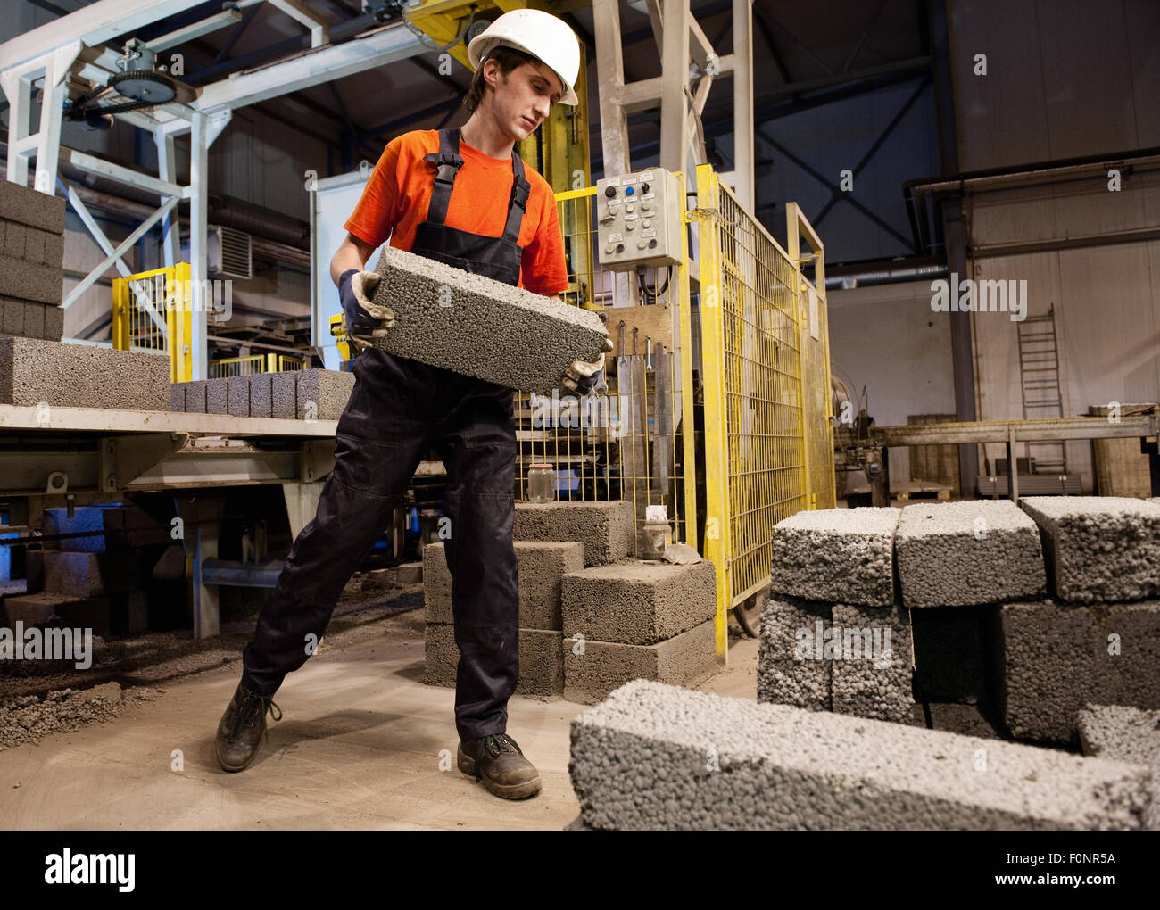 Factory loader at work Stock Photo - Alamy