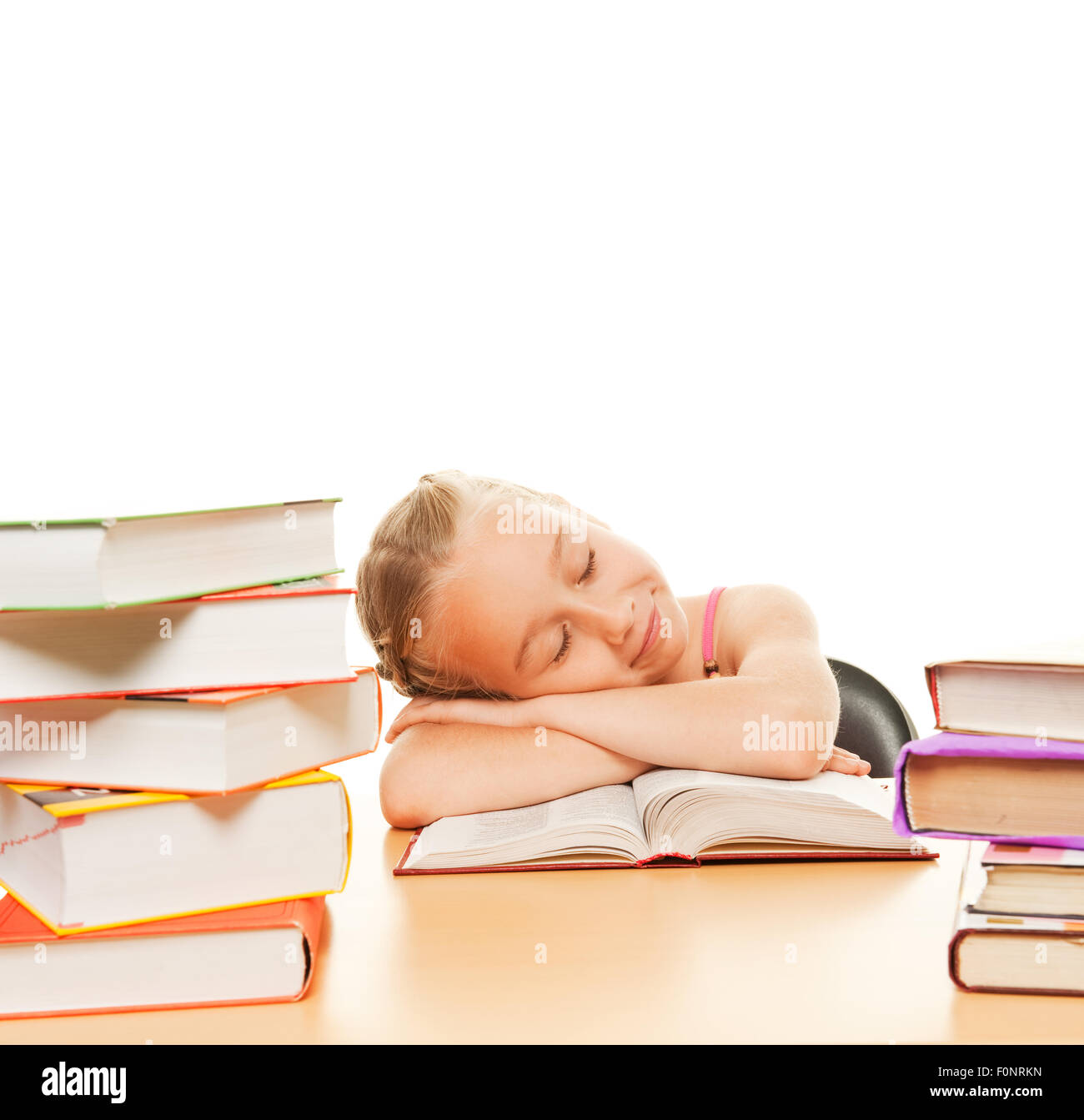 Little schoolgirl fall asleep after reading a book Stock Photo - Alamy