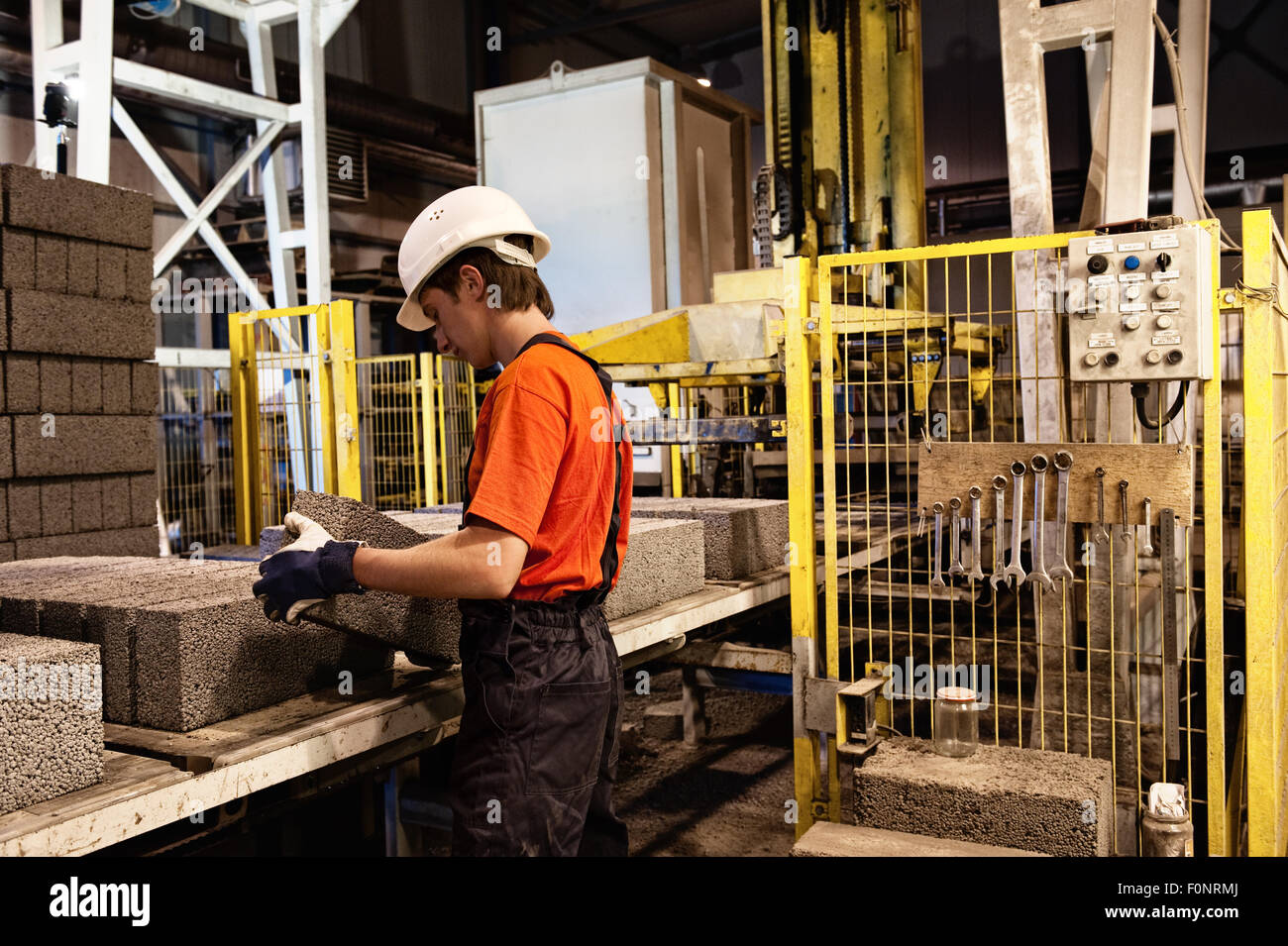 Factory loader at work Stock Photo - Alamy