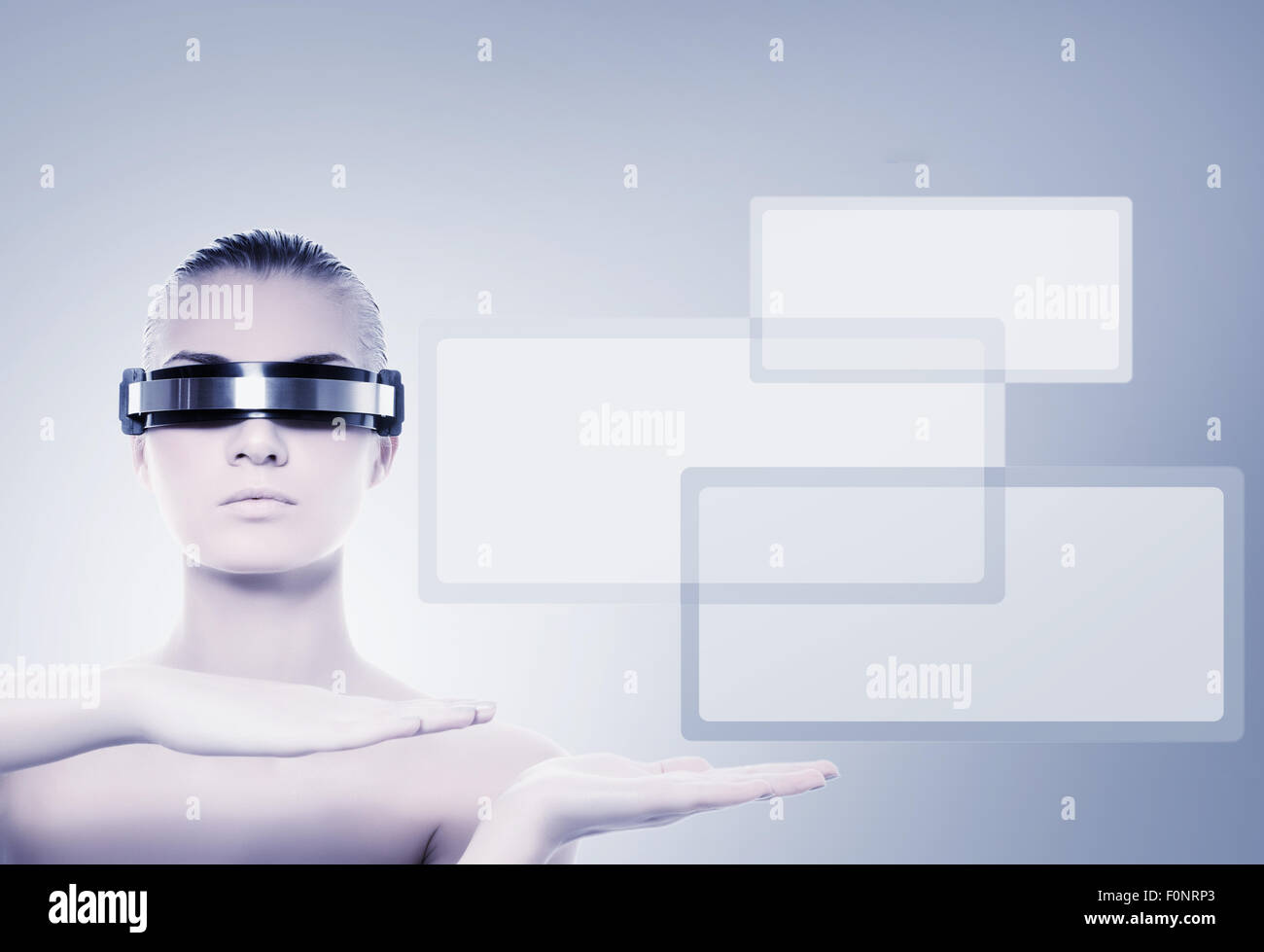 Beautiful cyber woman isolated on blue background Stock Photo - Alamy
