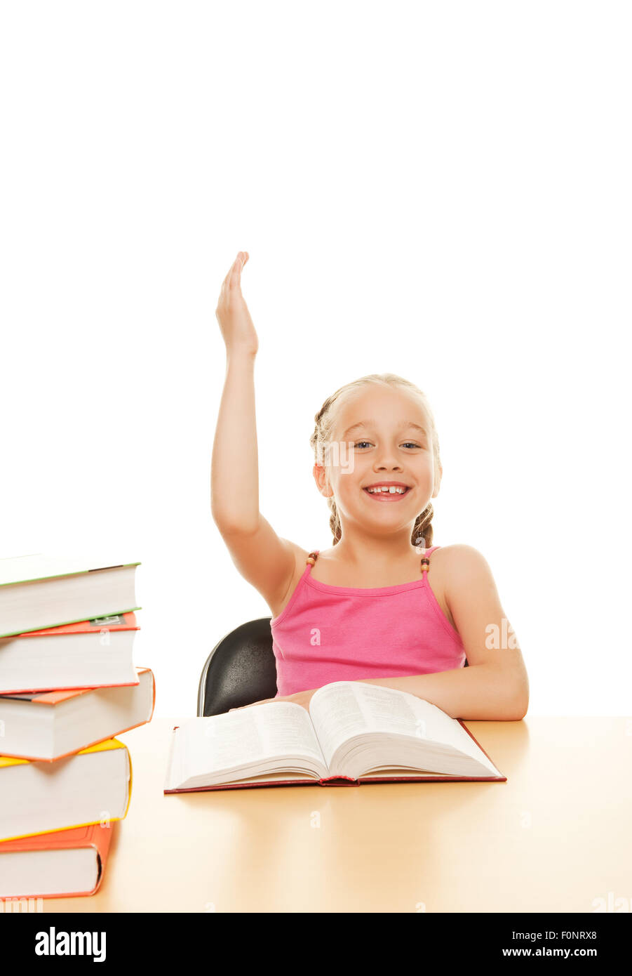 Little schoolgirl raised her hand to answer question Stock Photo - Alamy
