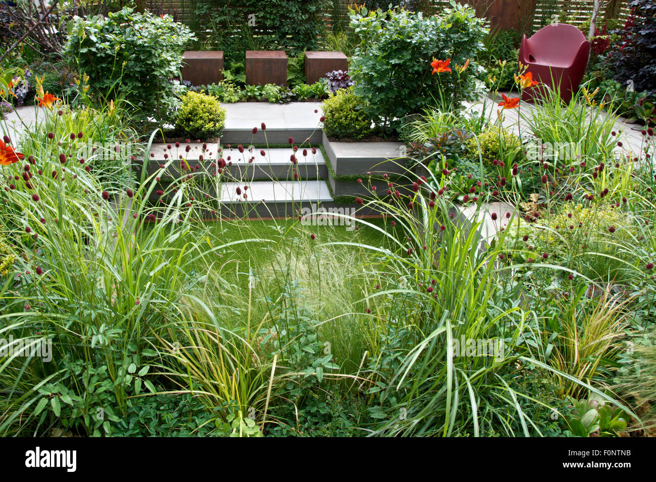 Deep red chair complimentary planting hi-res stock photography and ...