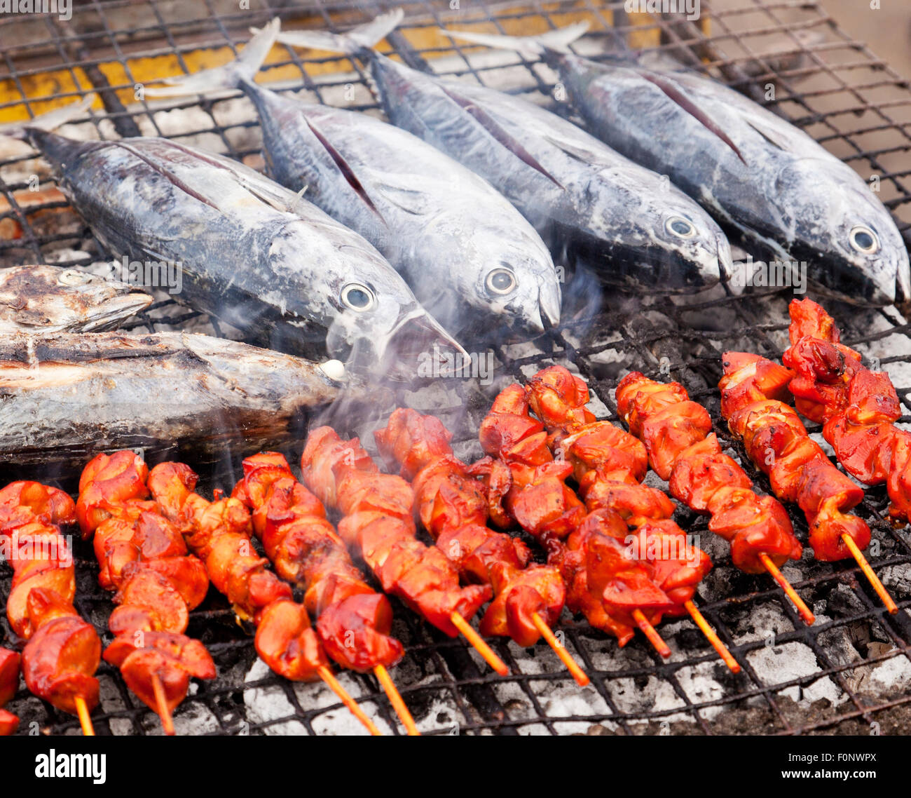 Barbecue fish and meat Stock Photo - Alamy