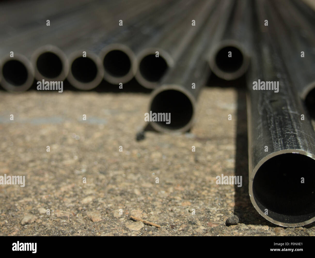 Stack of Many Pipes at the Construction Site Stock Photo - Alamy